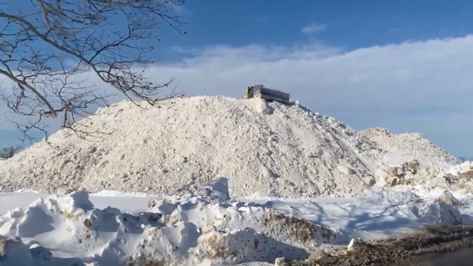 Piles of New York Snow End up in Parking Lot | WeatherBug