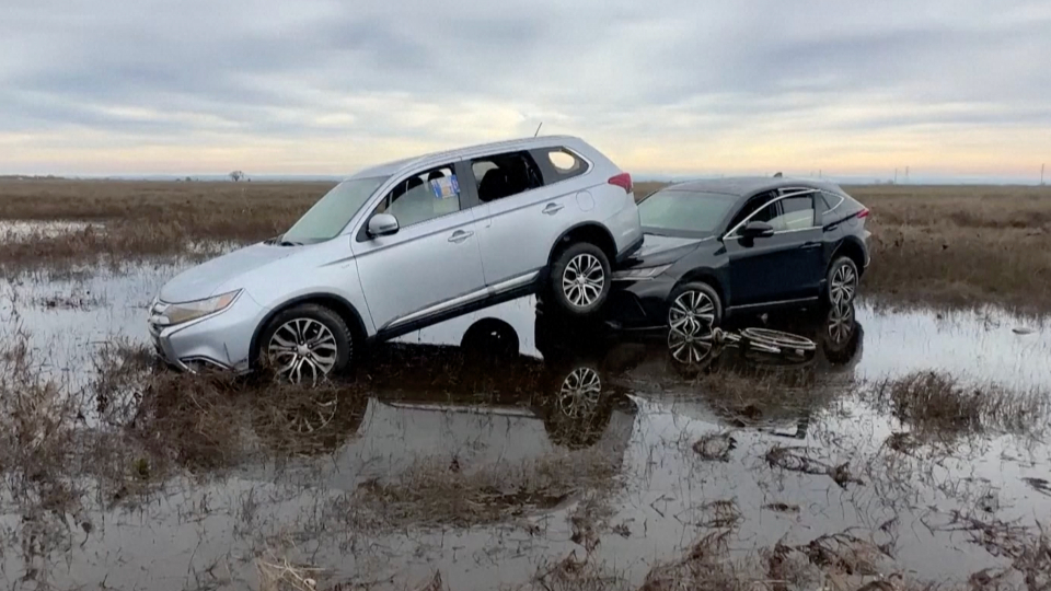 Stranded Vehicles Emerge From Floodwaters | WeatherBug