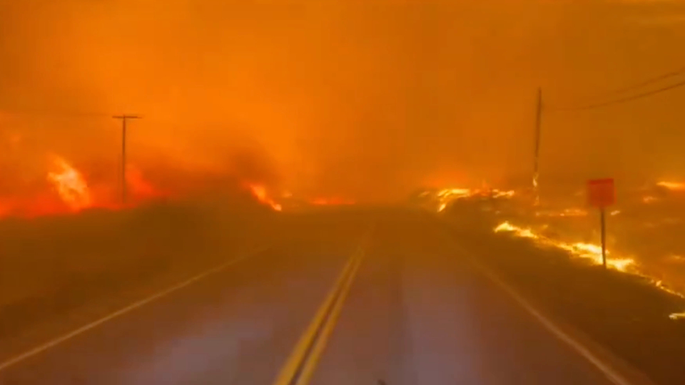 Fire Crews Pass Through Flames While Battling Fire | WeatherBug