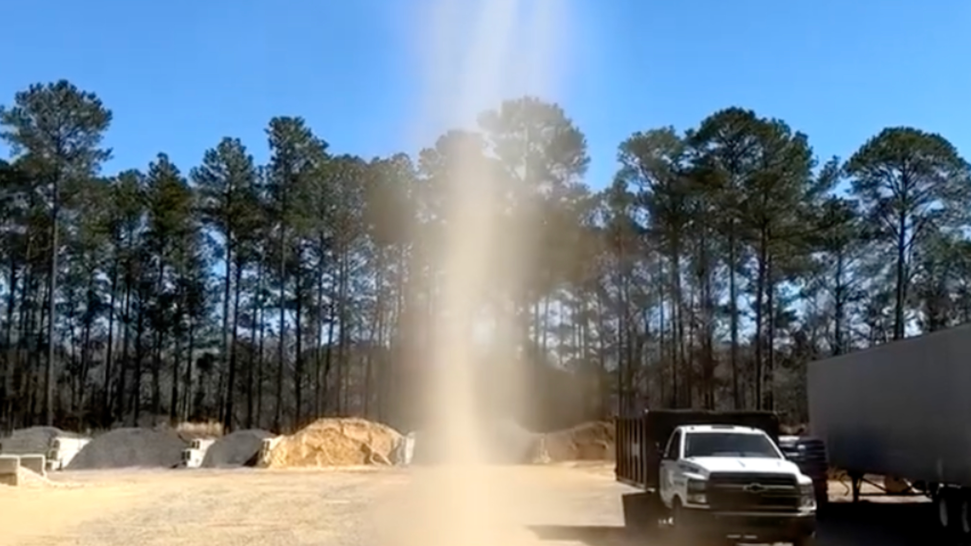 Dust Devil Swirls in Construction Yard | WeatherBug