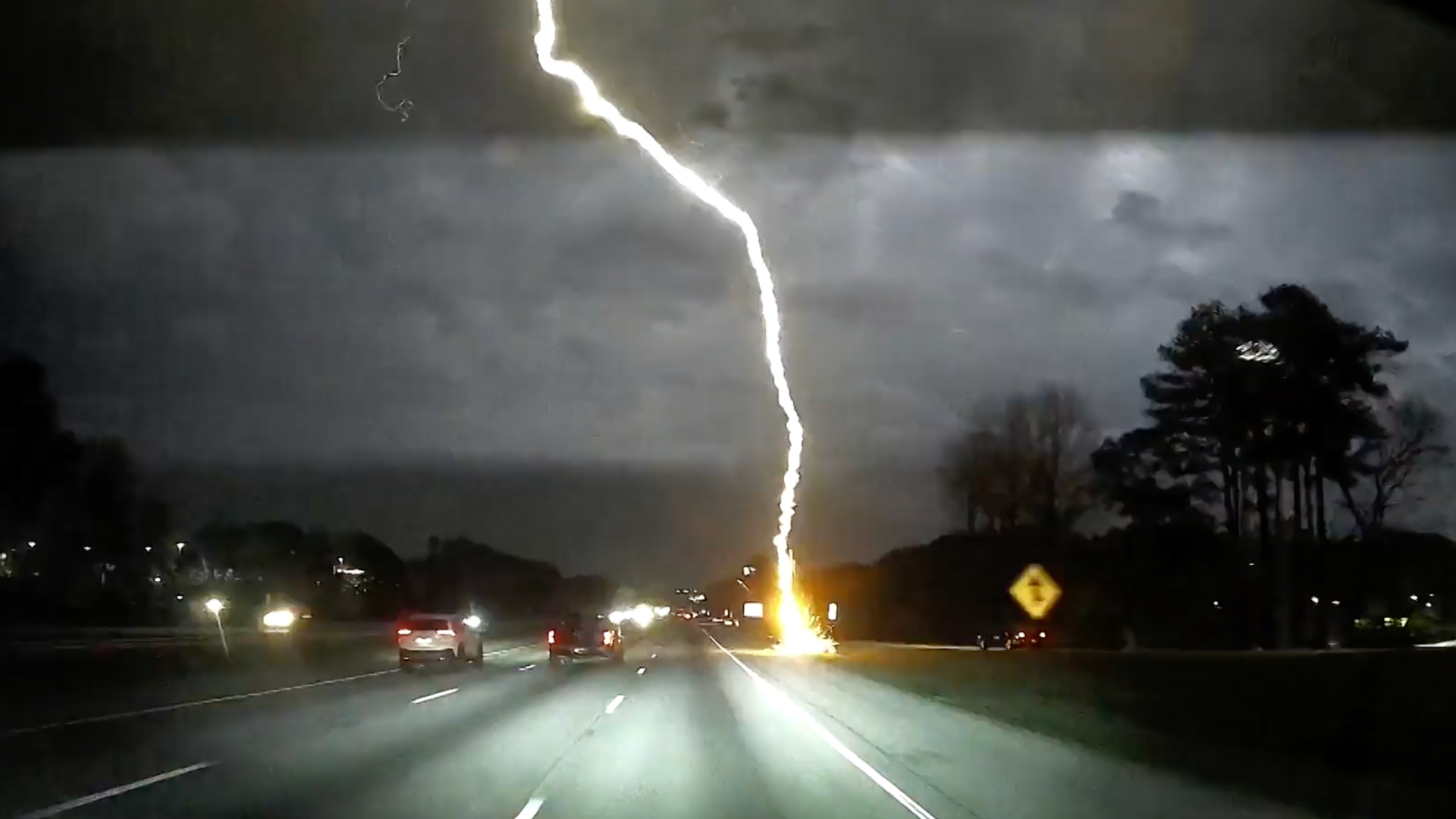 Lightning Strikes Directly in Front of Vehicle | WeatherBug