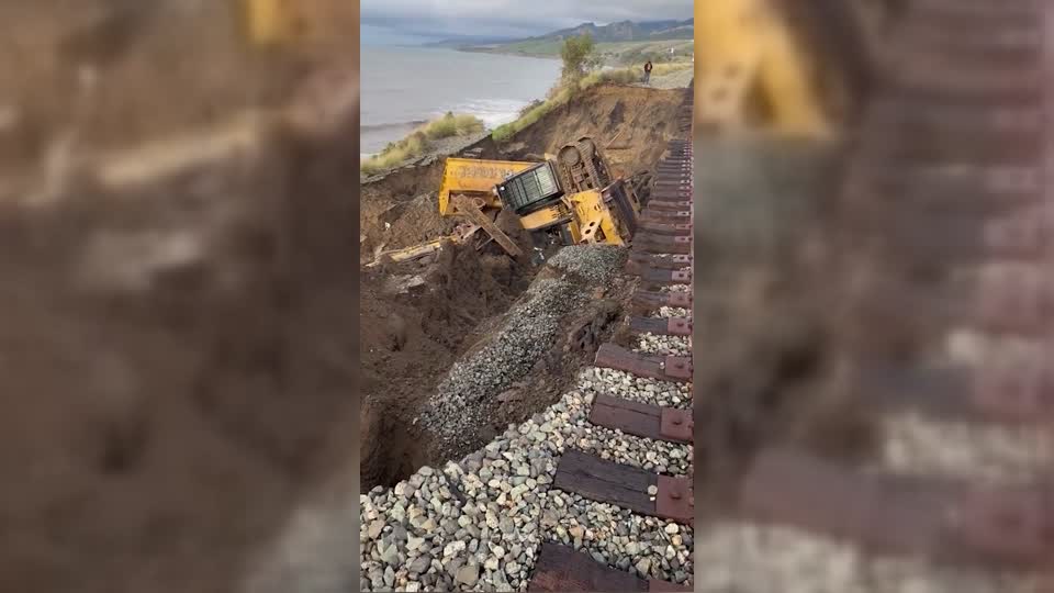Erosion Collapse Sends Excavator Tumbling | WeatherBug
